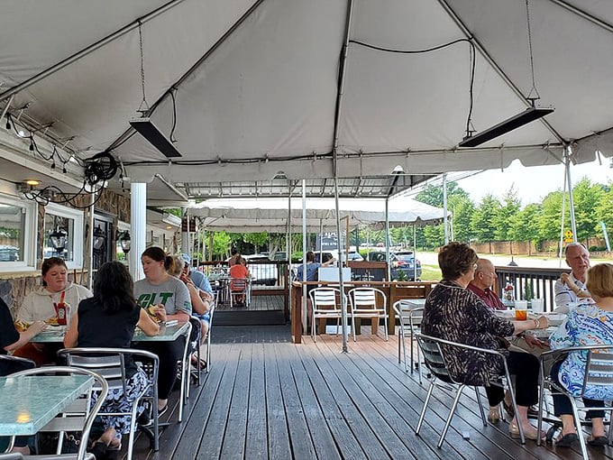 The outdoor patio—where summer evenings stretch into memory and nobody rushes you through that last bite or sip.