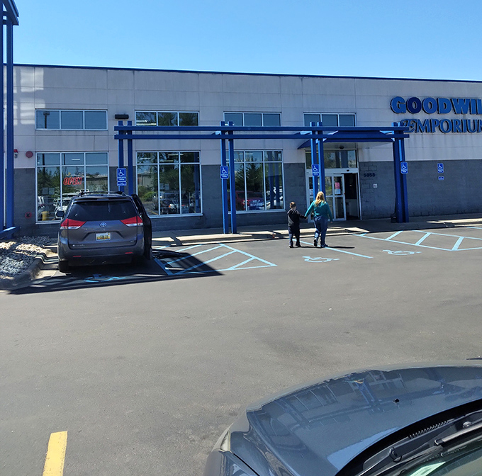 Even the parking lot feels welcoming with its bright blue accents—the first hint that bargain therapy awaits just beyond those doors.