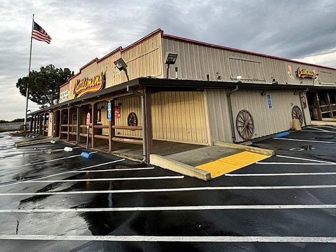 Rain or shine, the American flag flies proudly outside this temple of beef—a landmark for hungry travelers seeking salvation by steak.