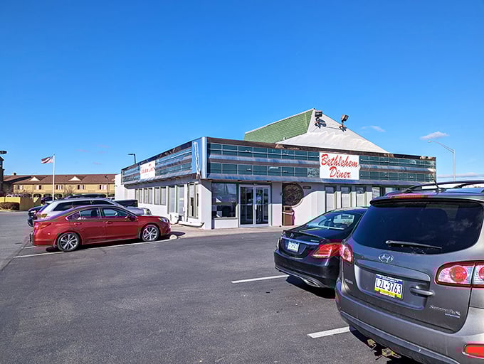 The parking lot tells the real story—filled with cars of loyal customers who know that behind that retro sign lies breakfast nirvana.