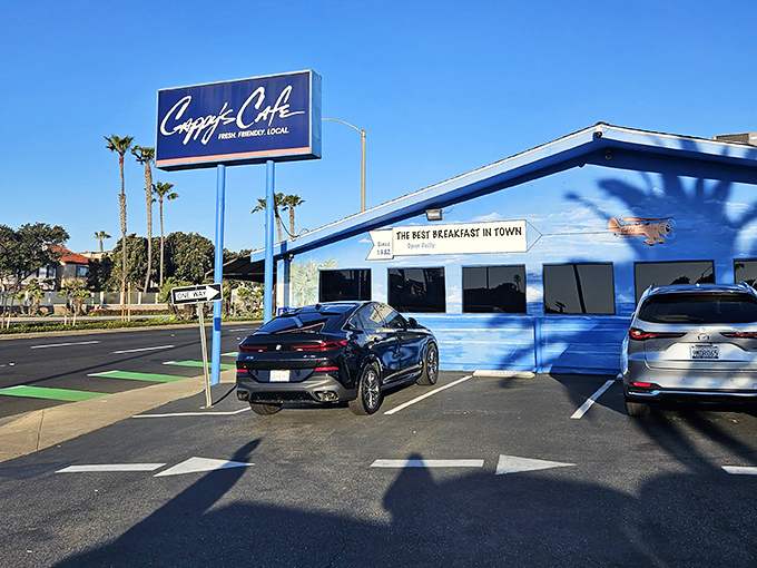 The blue exterior stands out against the Newport Beach sky – a landmark that says "turn here for happiness" to hungry travelers and locals alike.