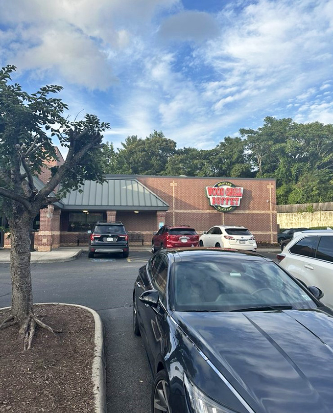 The parking lot view that sparks joy in hungry travelers—like spotting an oasis after crossing a desert of chain restaurants.