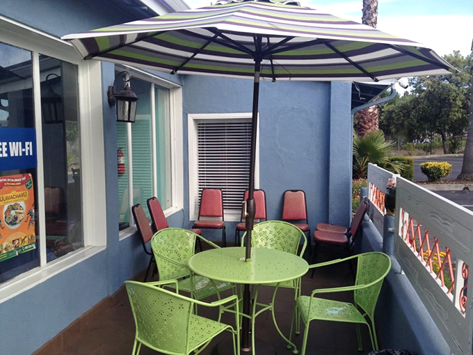 The patio at UlavacharU offers a moment of California sunshine between courses – those green chairs practically begging you to linger.