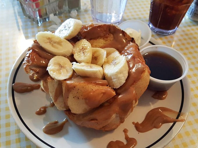 Peanut butter and banana French toast that would make Elvis weep with joy. Caramel drizzle turns this breakfast into dessert, and nobody's complaining.