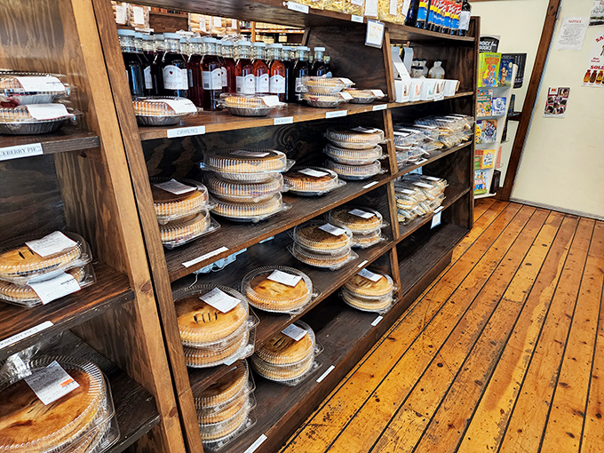 Homemade pies stacked like edible vinyl records in a bakery jukebox. Each one promises a different hit of sweetness to balance all that savory cheese.
