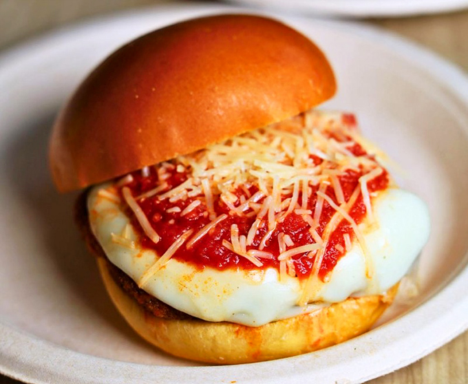 The pizza burger—when you can't decide between two comfort food classics, so they join forces like delicious superheroes on a bun.