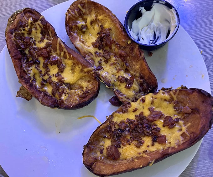 Potato skins that could convert a carb-avoider back to the starchy side. Crispy vessels loaded with cheese and bacon—the ultimate shareable indulgence.