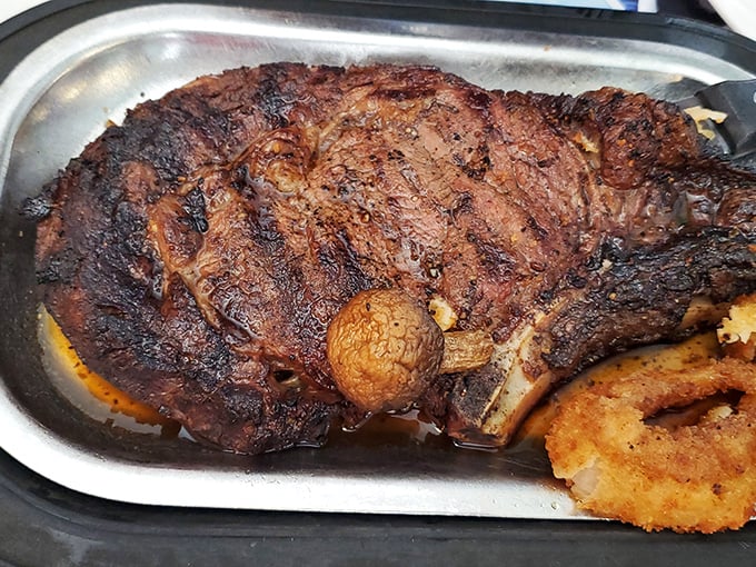 A prime rib so substantial it needs its own area code, perfectly charred on the outside while maintaining that juicy, tender interior carnivores dream about.
