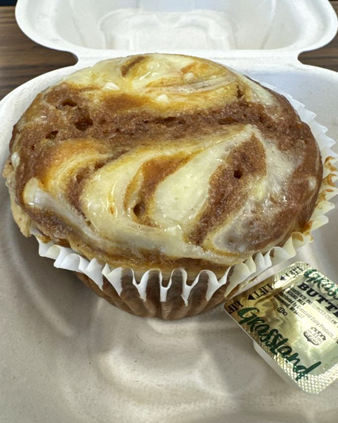 This cinnamon-swirled muffin isn't just breakfast—it's dessert with an alibi, a morning indulgence that somehow feels both decadent and completely necessary.