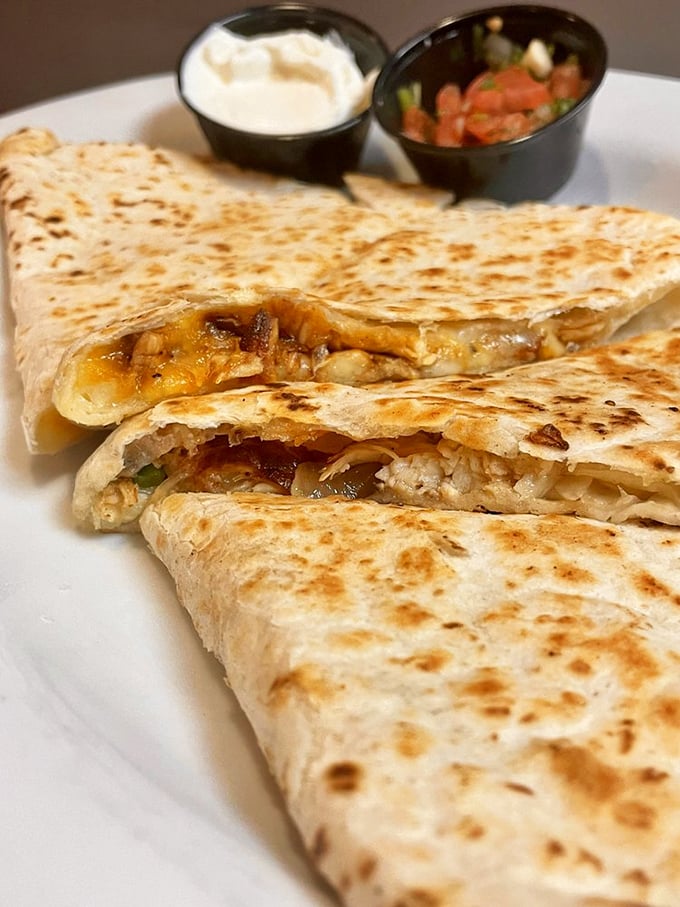 Quesadillas that achieve the perfect cheese pull—crispy outside, molten inside. Proof that this diner knows its way around more than just burgers.