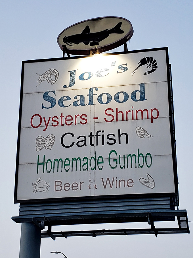 A roadside beacon of culinary promise—Joe's sign listing seafood treasures like a delicious table of contents for your next meal.