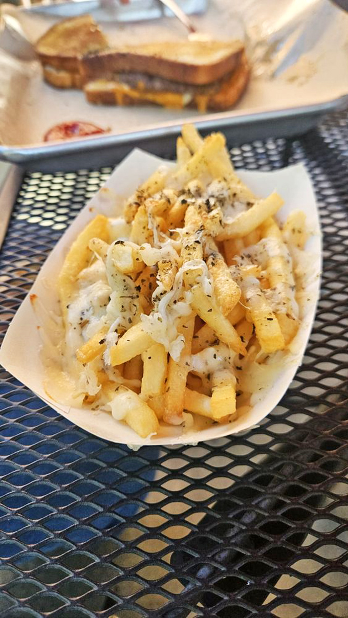 These aren't just cheese fries—they're a masterclass in indulgence. Golden, crispy, and draped in melted cheese that stretches with each bite.