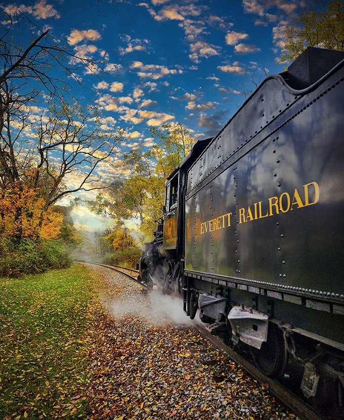 Fall foliage creates nature's perfect backdrop for the Everett Railroad—a calendar-worthy scene that's even better in person.