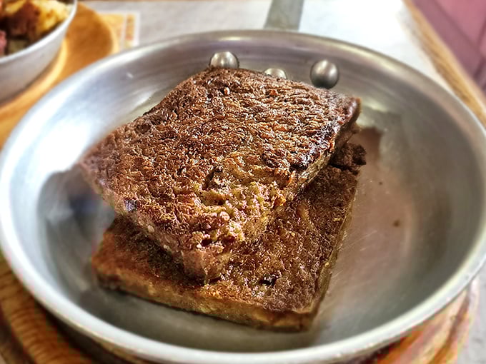 Scrapple—Pennsylvania's breakfast contribution to the world—perfectly crisped and ready to convert even the most skeptical of breakfast adventurers.