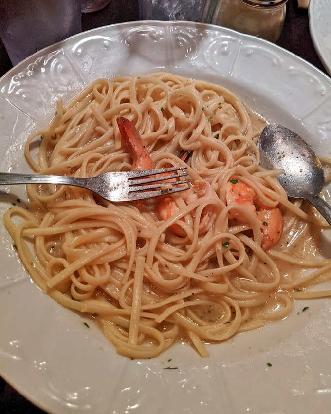 Shrimp scampi linguine where garlic and butter have clearly made a pact to transport your taste buds straight to coastal Italy without the airfare. 