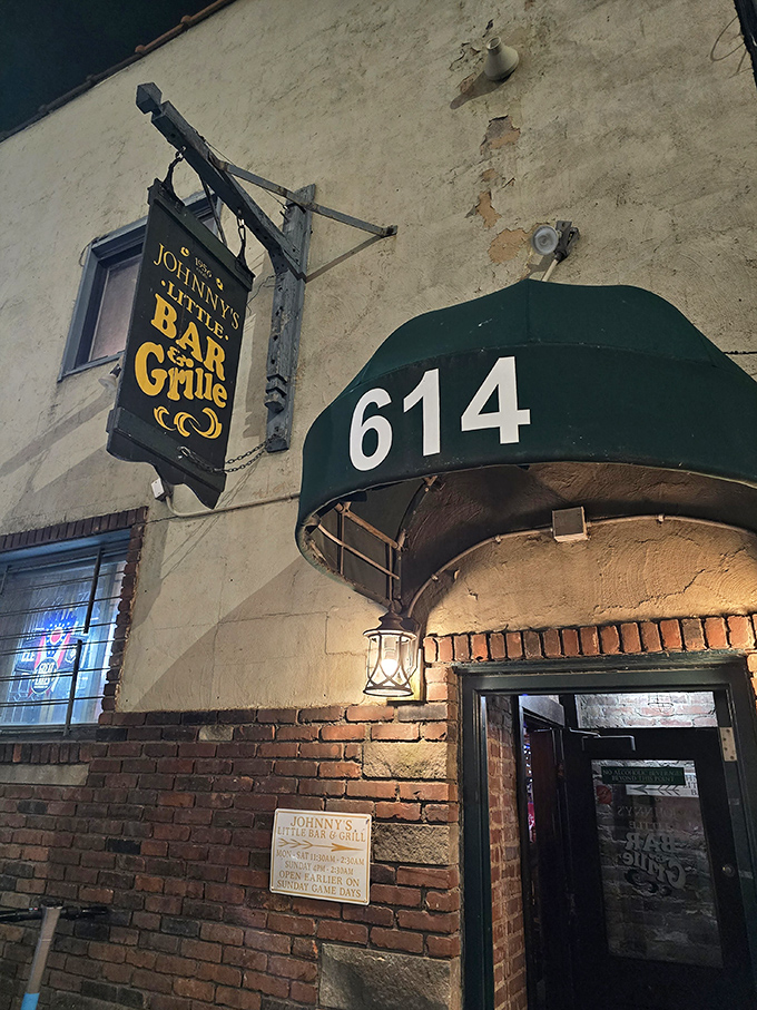 After dark, the sign beckons like a lighthouse for the hungry. Johnny's exterior may be humble, but what awaits inside is anything but. 