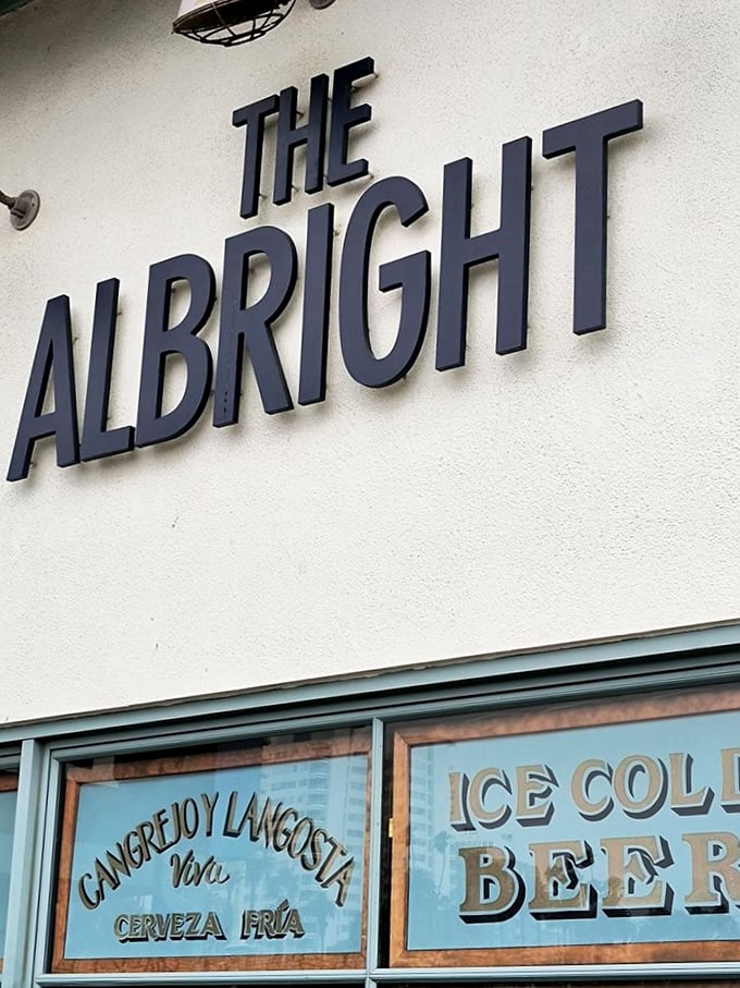 That sign doesn't just spell a name—it promises an experience. Bold letters announcing your arrival at seafood nirvana.