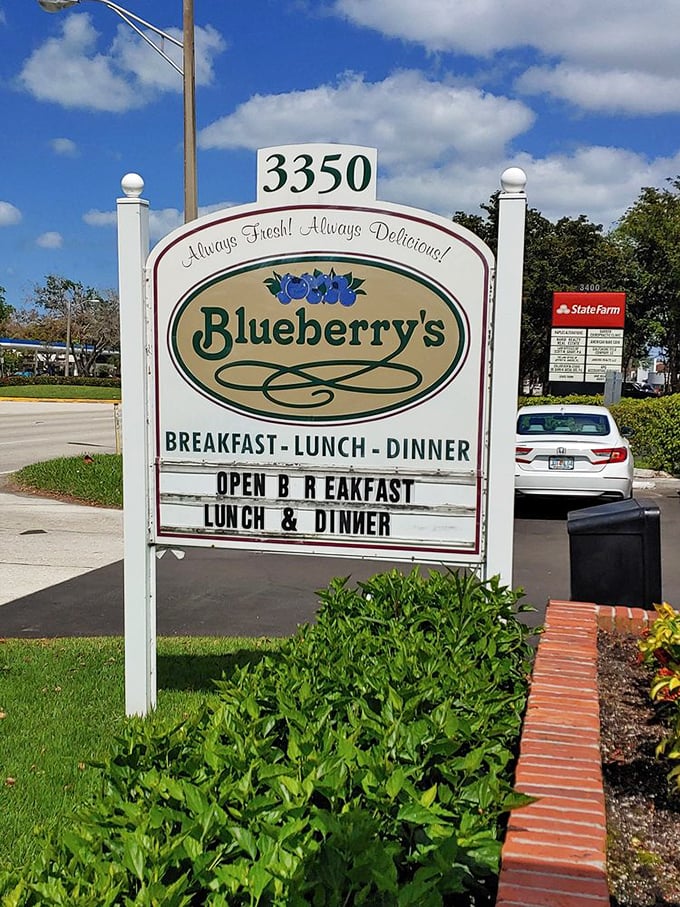 The sign promises three meals daily, but let's be honest—we're all here for those legendary breakfast offerings.
