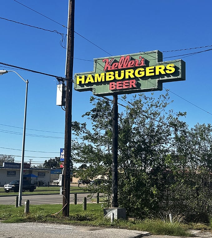 The iconic sign stands tall against the Texas sky, a beacon of burger hope. Three simple words—Keller's, Hamburgers, Beer—all you need to know.