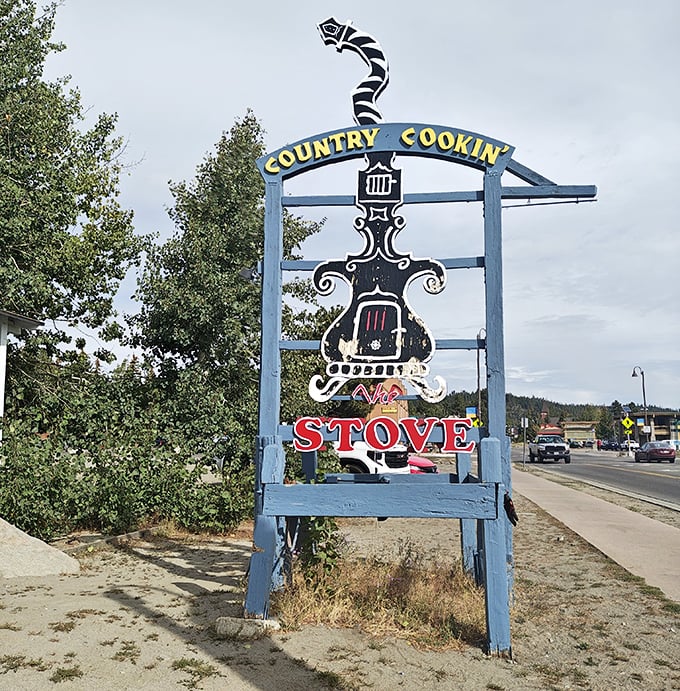 "Country Cookin'" isn't just a sign—it's a promise that's been kept for generations. This blue roadside beacon has guided hungry travelers to breakfast salvation.