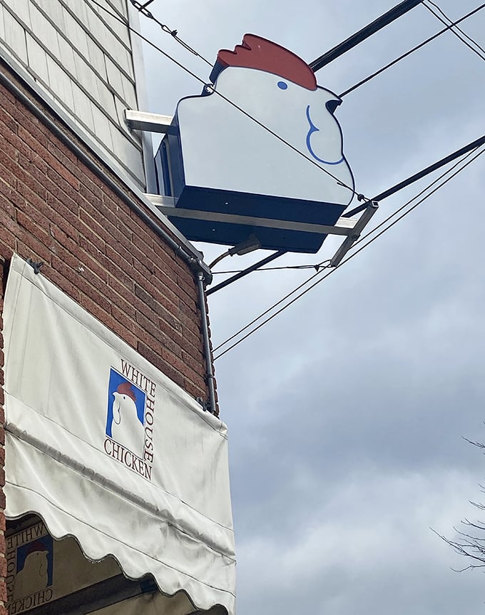 That rooster sign isn't just advertising—it's a beacon of hope for hungry travelers seeking the holy grail of Barberton-style fried chicken.