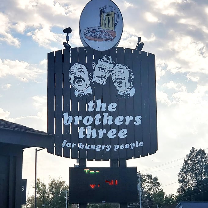 That iconic sign has been guiding hungry travelers to pizza salvation for years – a beacon of hope on Marinette's skyline.