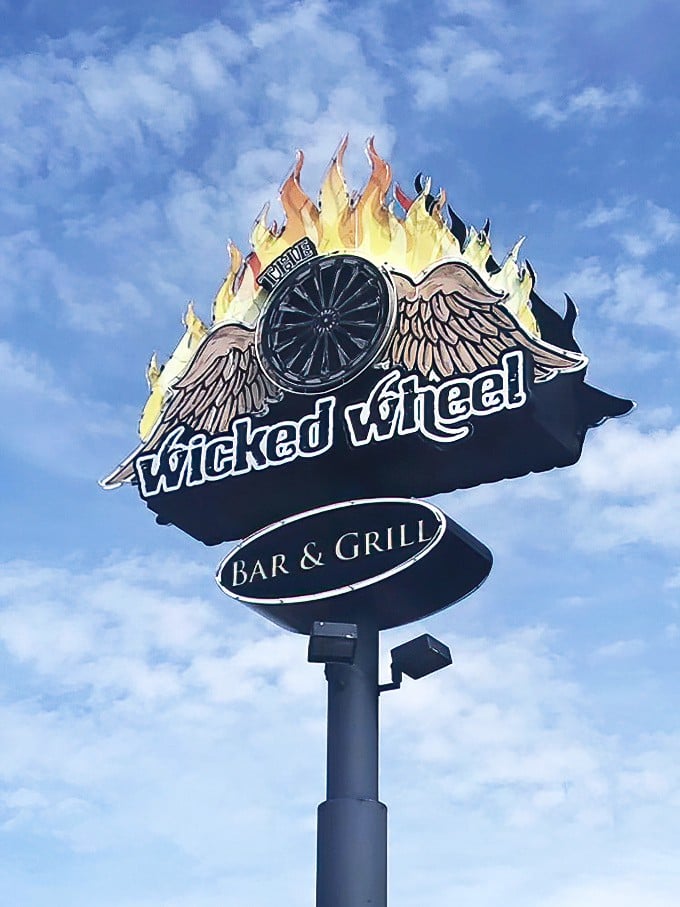 The sign that beckons hungry travelers like a lighthouse for the famished. That flaming wheel means you've found your destination.