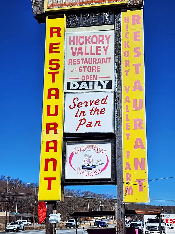 The roadside sign promises "Served in the Pan" dining—a bold claim that Hickory Valley delivers on with every sizzling plate.