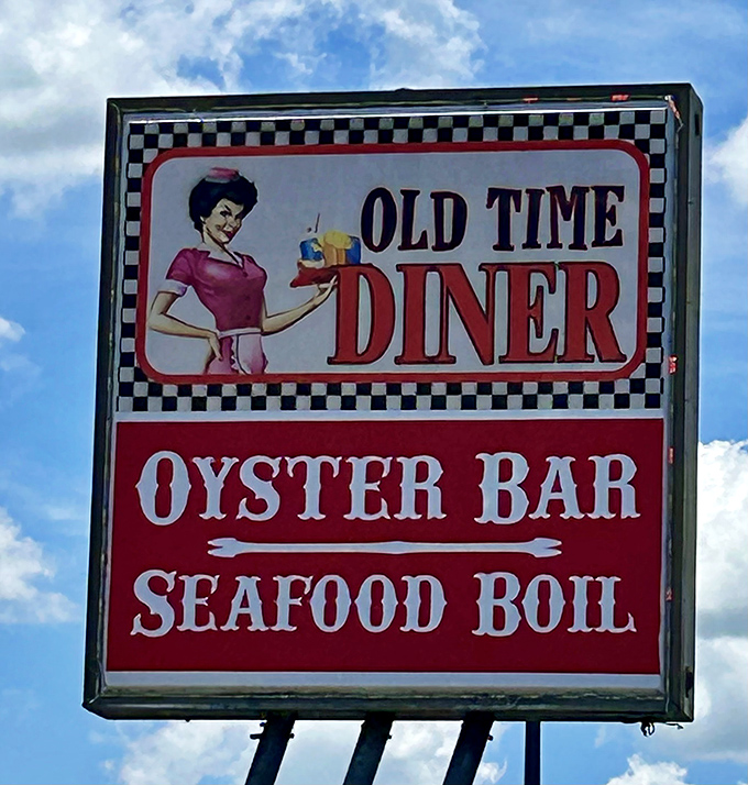 The sign promises seafood and nostalgia in equal measure—a roadside beacon for hungry travelers who know diners are the real Florida attraction.