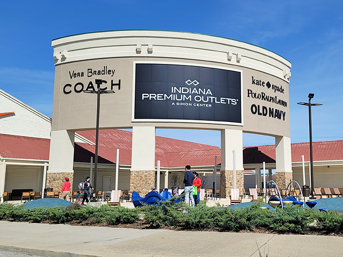 The grand entrance announces retail royalty with Coach and Kate Spade—like the pearly gates of fashion heaven, but with much better prices.