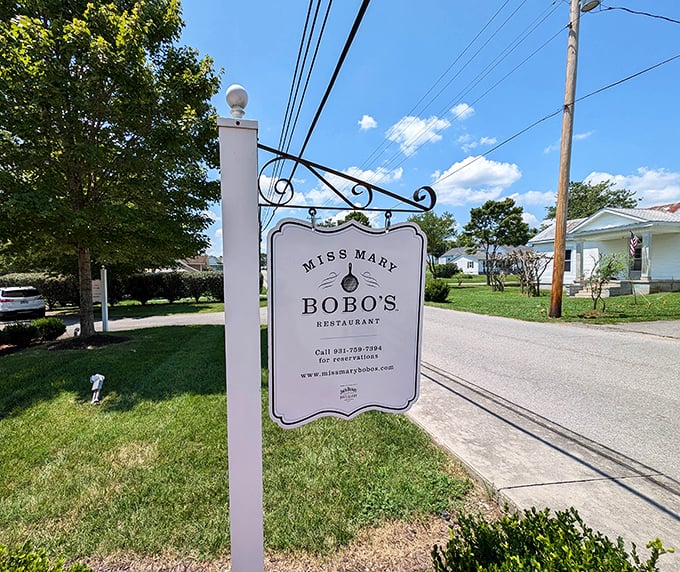 More than just a sign—it's a beacon for hungry travelers, promising authentic Southern cooking and hospitality just steps away.