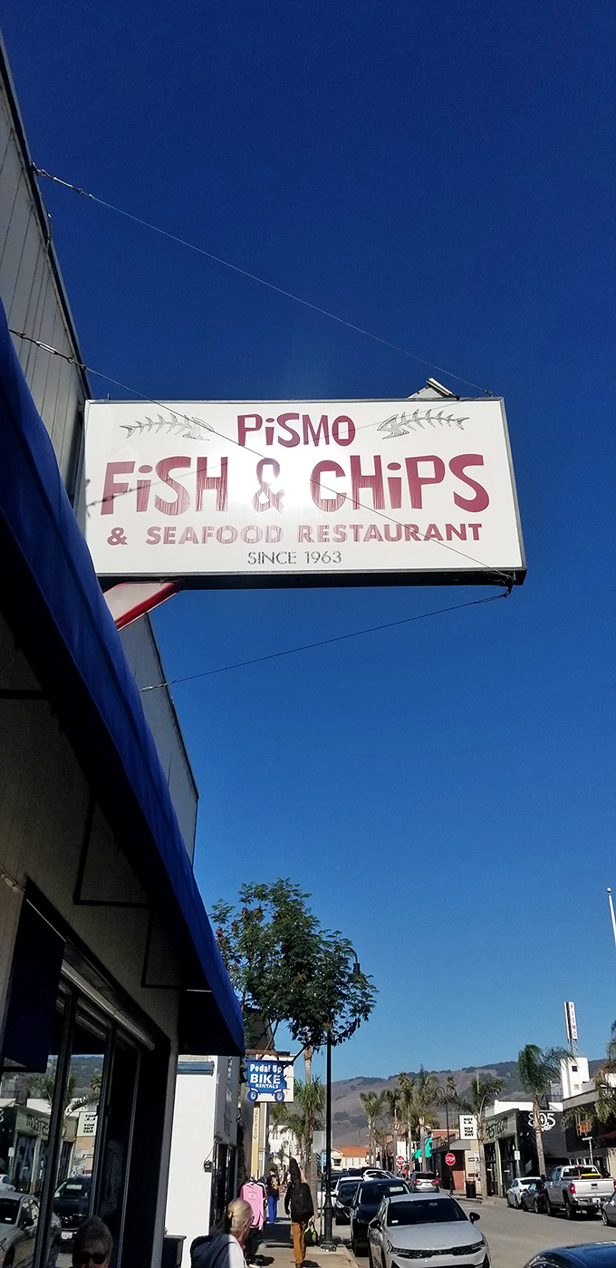 The sign against the blue California sky announces what locals already know—this is seafood worth making a detour for.
