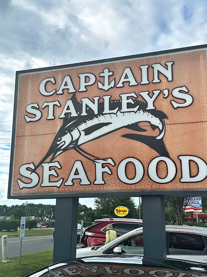 That marlin silhouette on the sign isn't just decoration – it's a promise of what awaits inside this seafood sanctuary.