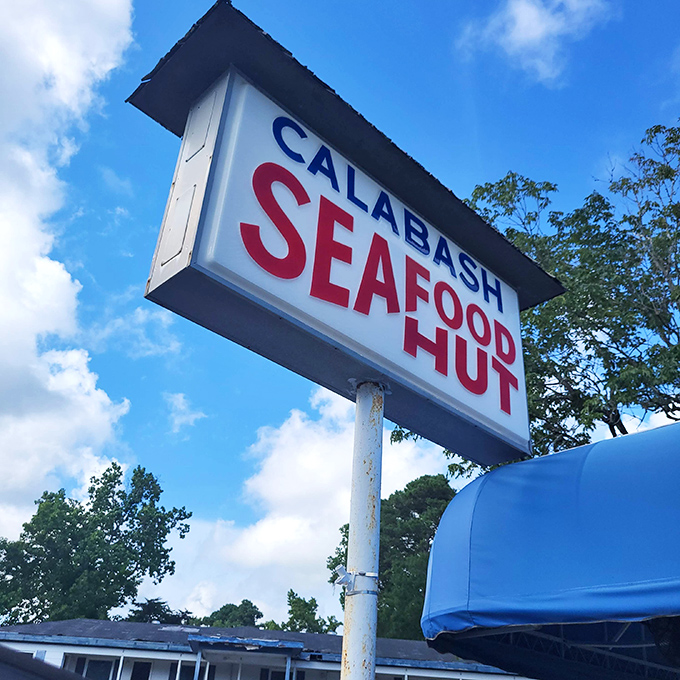 A sign that's guided hungry travelers for decades, standing tall against Carolina blue skies. More effective than any GPS: just follow your nose.