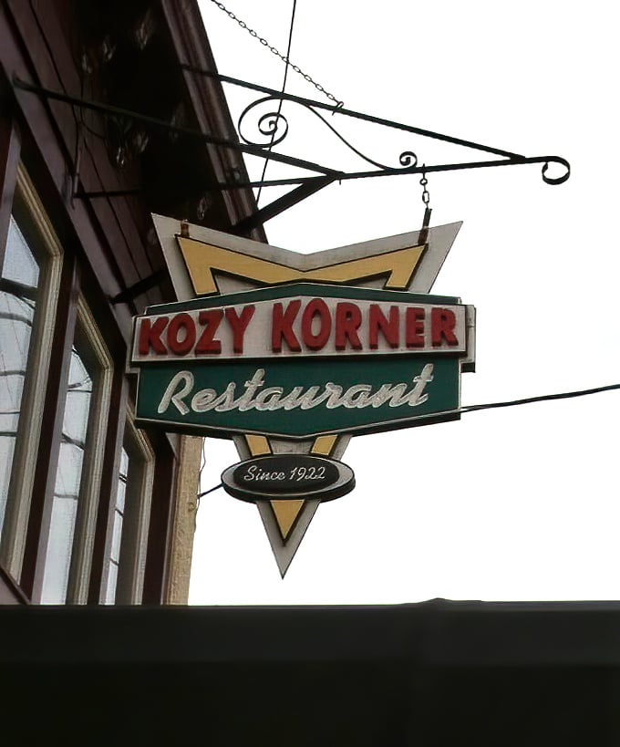 "Since 1922"—three simple words on this vintage sign that explain everything about why Kozy Korner gets breakfast so right. A century of morning perfection.