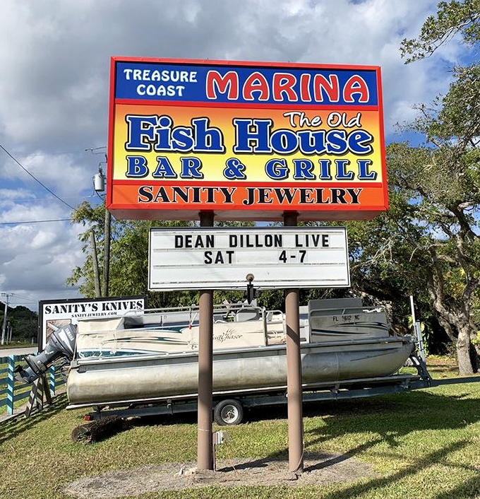 The kind of roadside sign that makes you immediately cancel whatever plans you had and make a U-turn—because live music and fresh seafood trump everything.