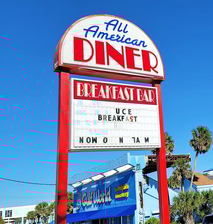 The marquee sign announces "BREAKFAST BAR" against the Florida sky—three syllables that might be the most beautiful words in the English language.