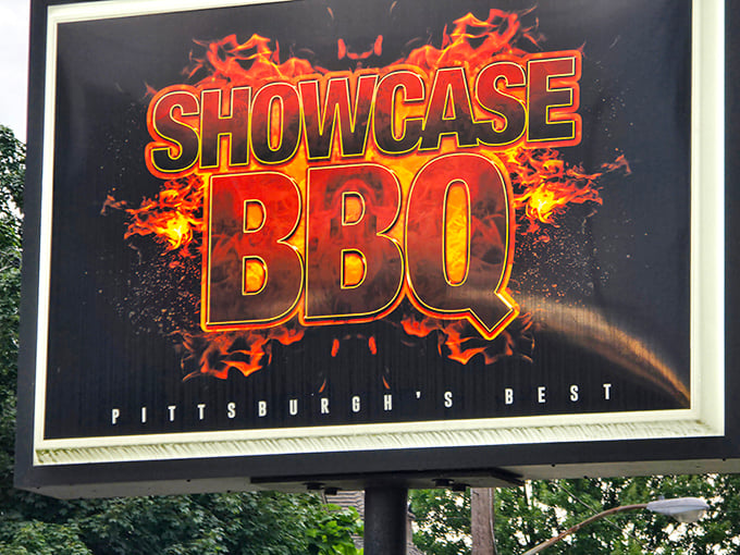 The sign says it all. When flames surround your logo, you're making a promise about flavor that Showcase BBQ delivers on spectacularly.