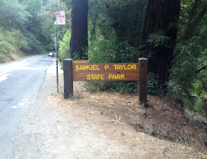 The unassuming entrance sign—like finding the door to Narnia on the side of a regular road. Adventure begins with a simple turn.