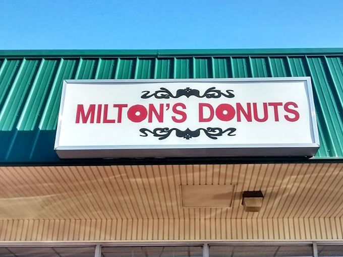 The sign that launches a thousand cravings. Simple, straightforward, and promising exactly what it delivers—donut perfection.