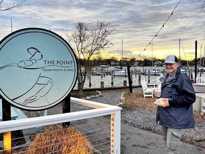 The Point's sign at sunset captures that magical golden hour when decisions about dessert become as important as world peace.