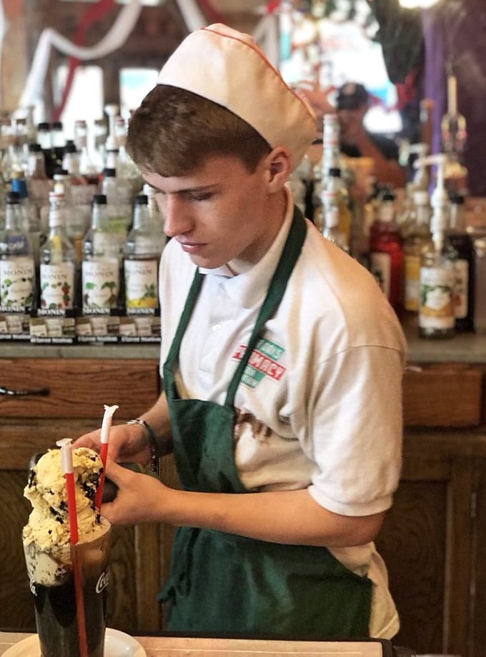 The soda jerk's uniform hasn't changed since Eisenhower, and honestly, why mess with perfection?