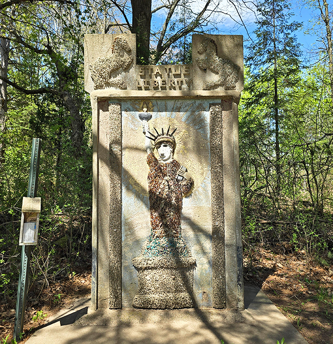 Lady Liberty, Northwoods edition—proving that freedom, like good folk art, stands tall even when constructed from humble materials.