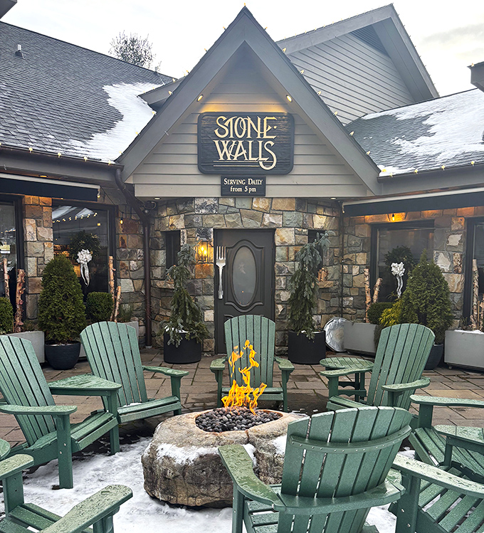 Stonewalls Restaurant's outdoor fire pit area—where s'mores are socially acceptable appetizers and ghost stories are on the menu.