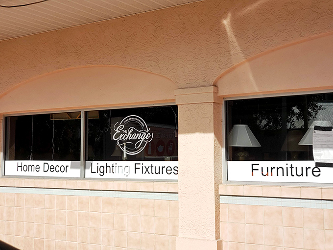 Clear storefront windows showcase the organized wonderland of treasures waiting inside this consignment paradise.