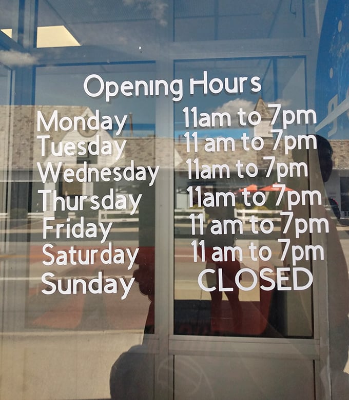 The hours posted clearly on the door – a six-day-a-week invitation to experience what might be Ohio's most honest food establishment.