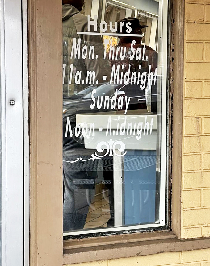 Hours posted like a promise—Johnnie's will be there for you, from morning until midnight, because beef cravings know no clock.