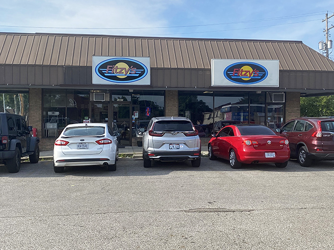 Full parking lot—the universal sign of food worth waiting for. Fitzy's loyal customers know that empty stomachs and empty spaces don't last long here.