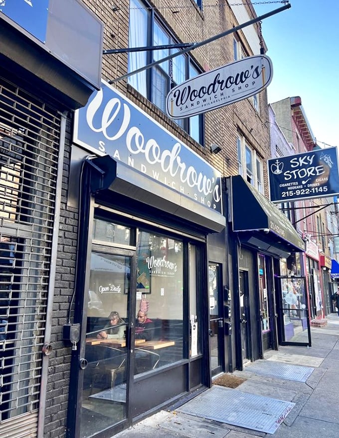 Morning light hits Woodrow's storefront like a spotlight—nature itself seems to be highlighting where you should eat lunch.