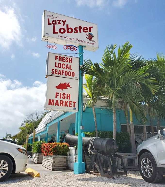 The street sign promises fresh local seafood and a fish market – basically advertising heaven for seafood enthusiasts.